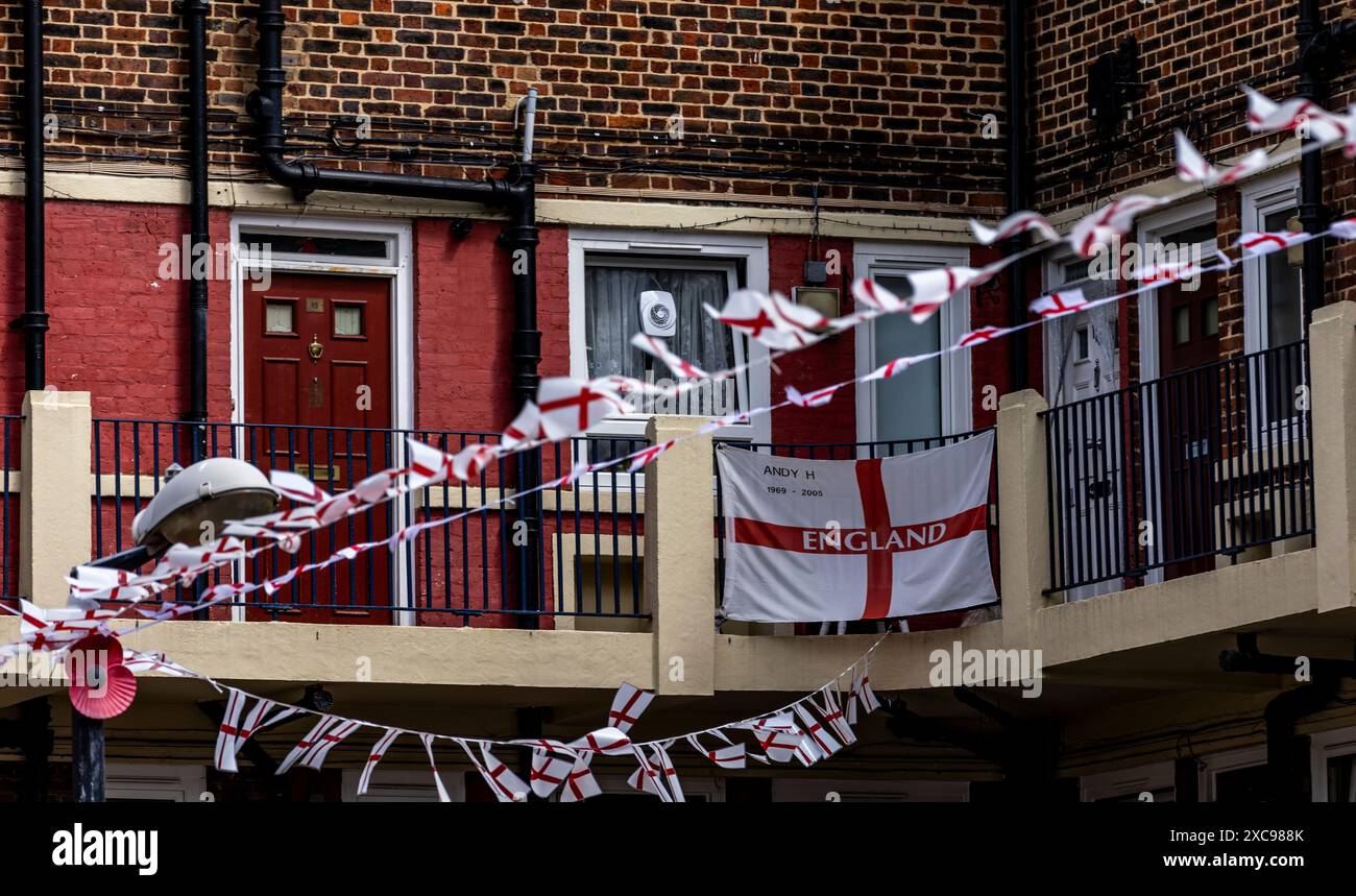 A general view of flags at the Kirby Estate, London. England will begin ...