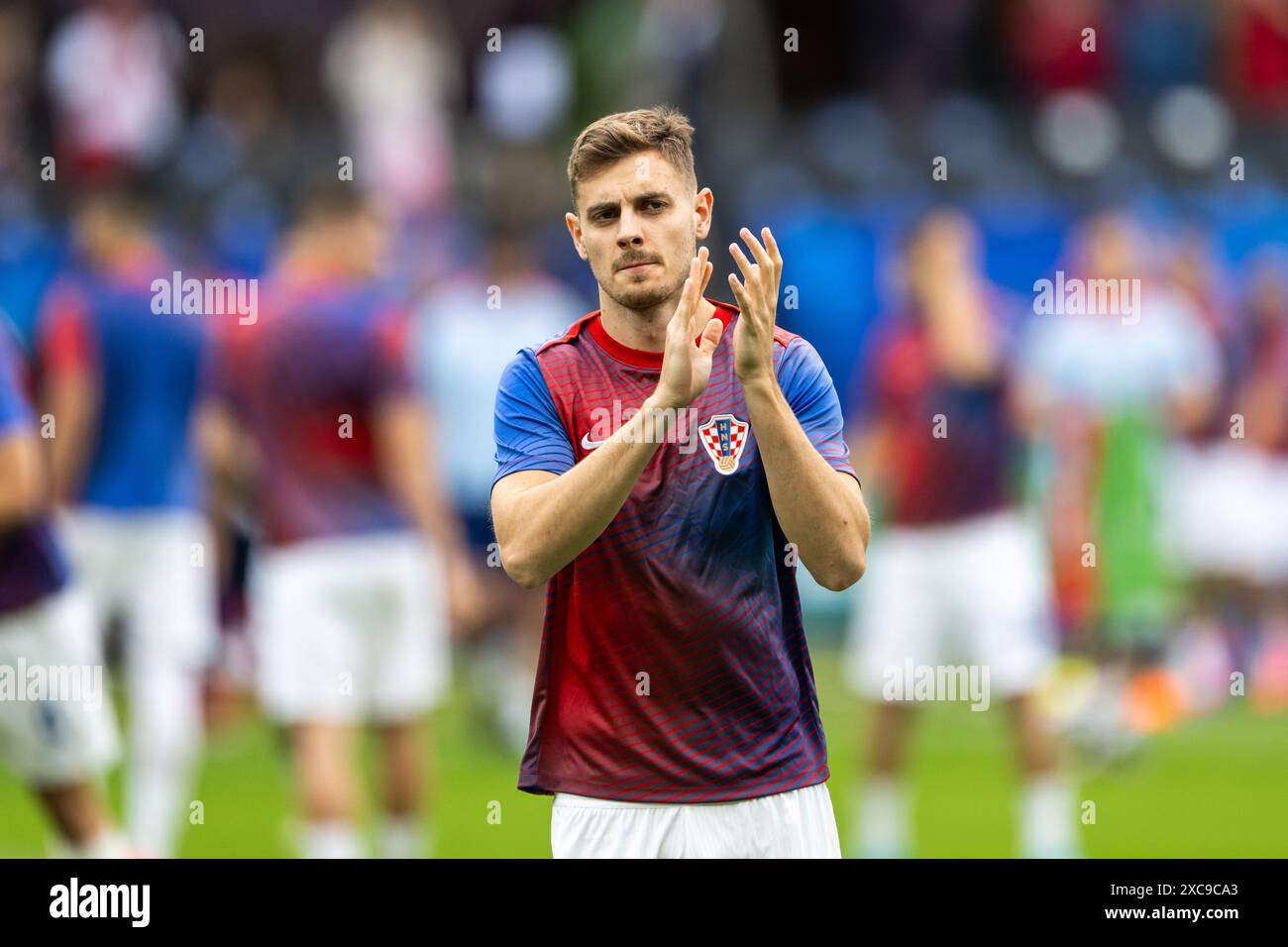 Berlin, Germany. 15th June, 2024. Josip Stanisic of Croatia is warming ...