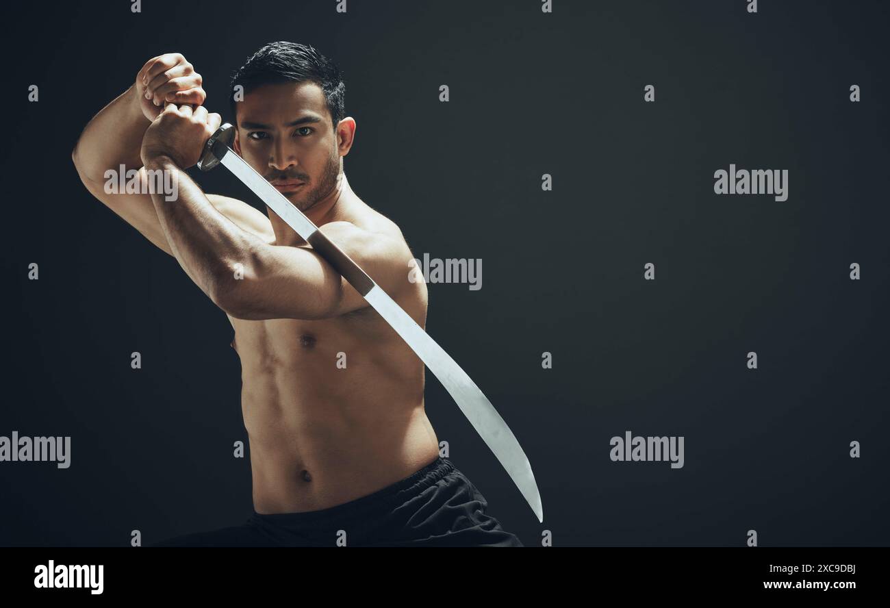 Man, samurai sword and portrait in studio for training, exercise and ...