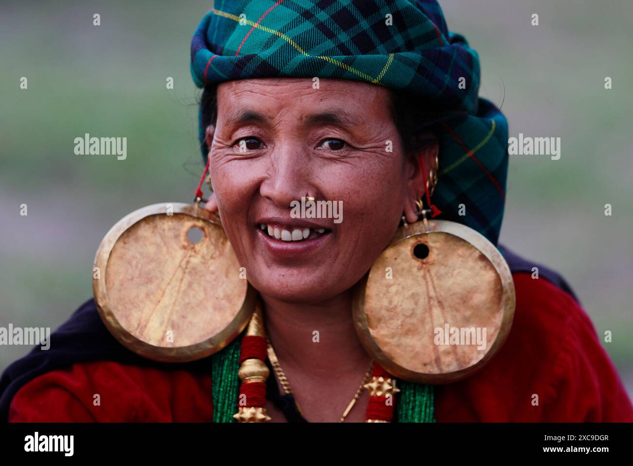Kathmandu, Nepal. 15th June, 2024. A woman with traditional jewelry on ...