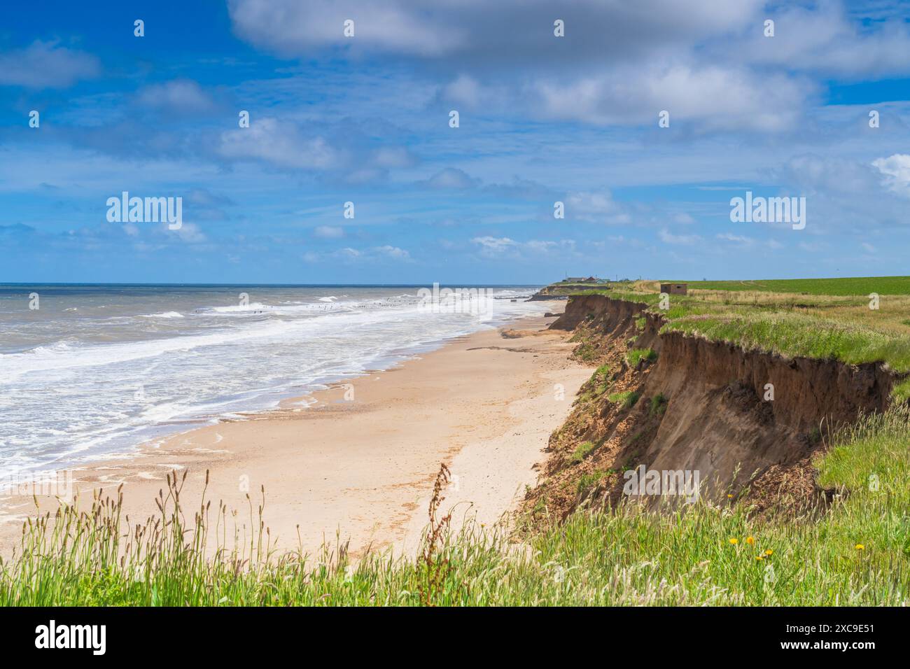 A view of a cliff highlighting coastal erosion at Happisburgh in North ...