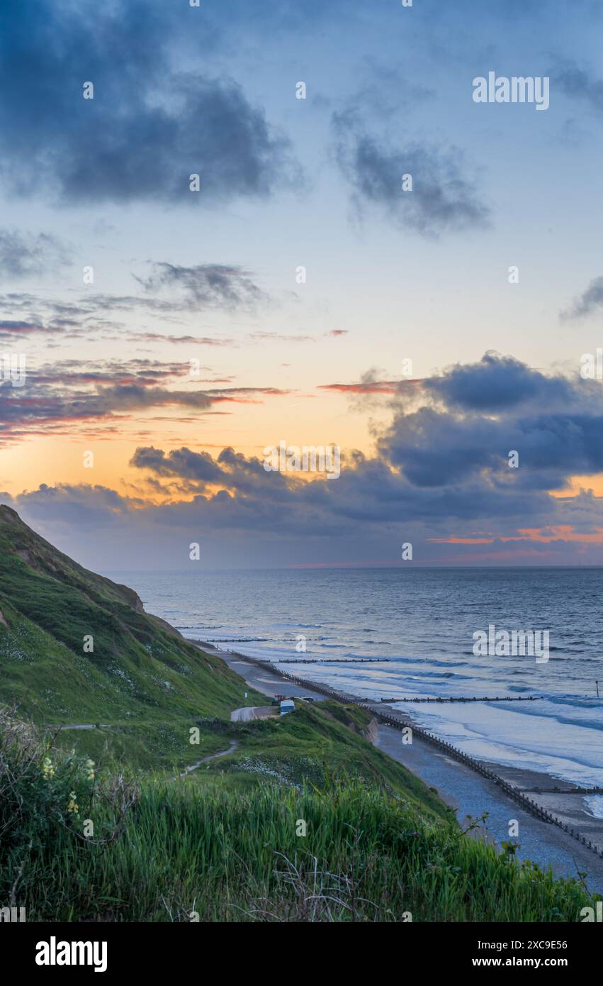 Trimingham beach sunset colours at dusk in portrait orientation Stock ...