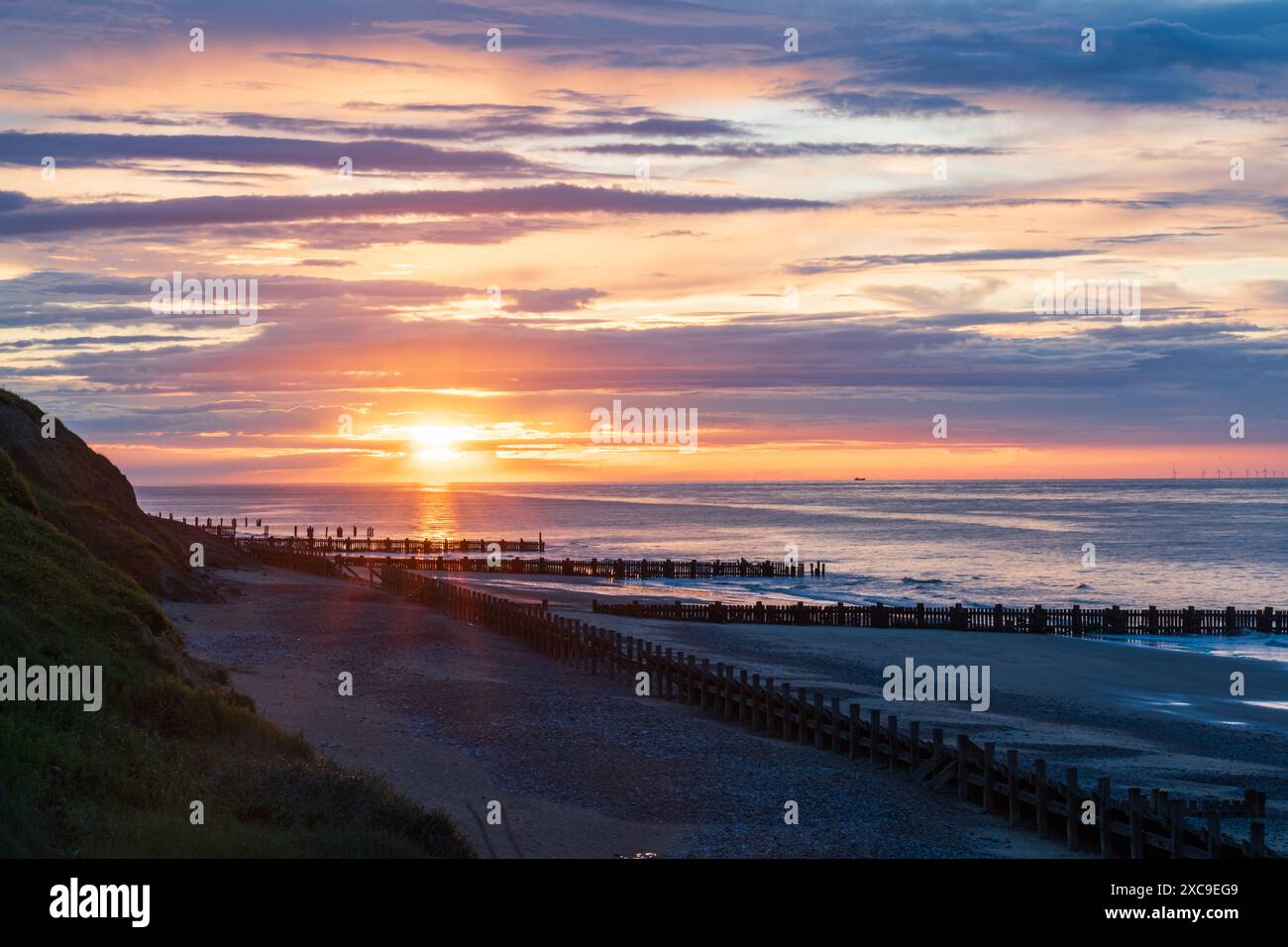 Beautiful sunset colours on the beach in Trimingham, Norfolk in the UK ...
