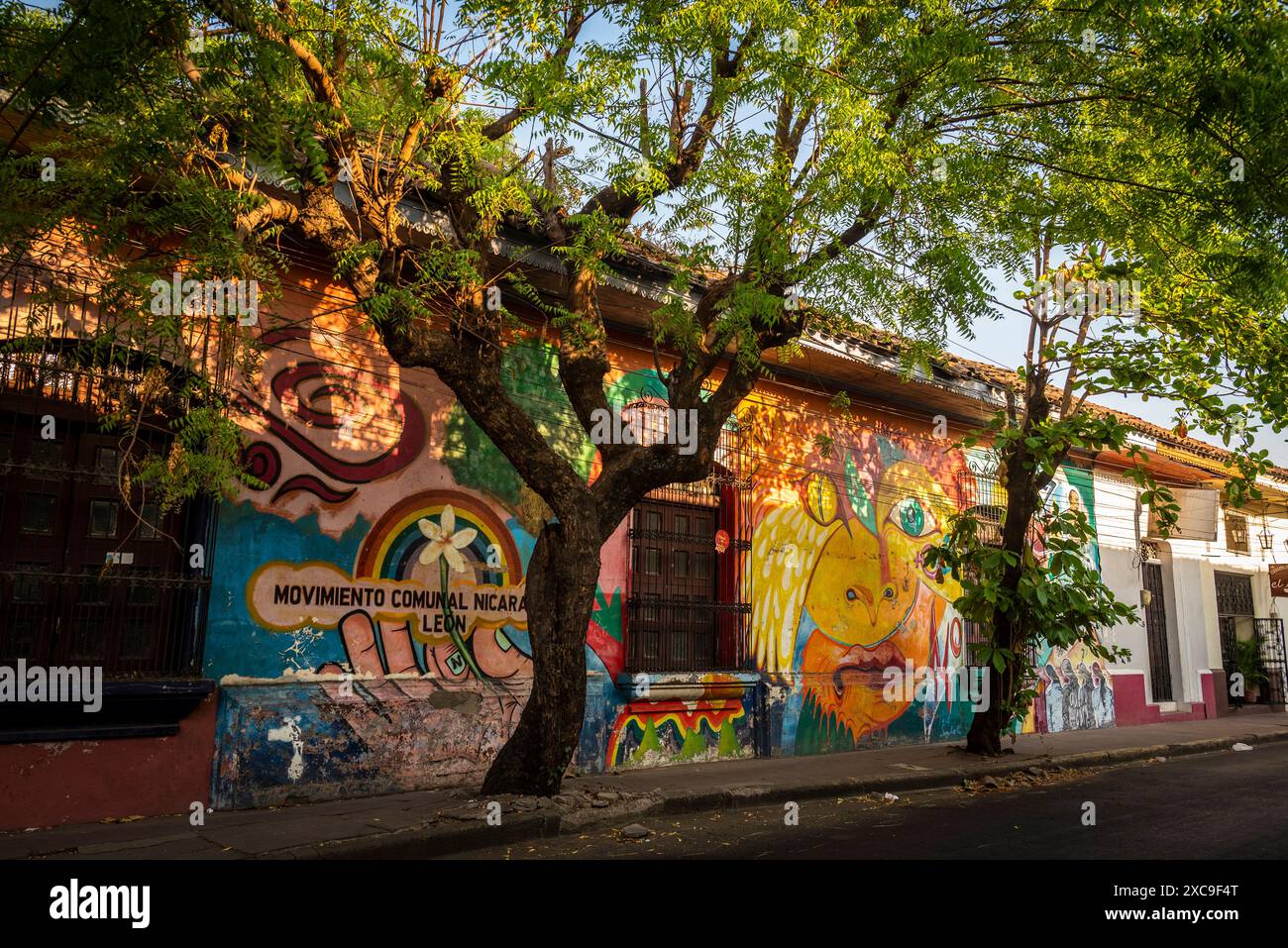Street with colourful community mural in the Colonial-era city centre ...