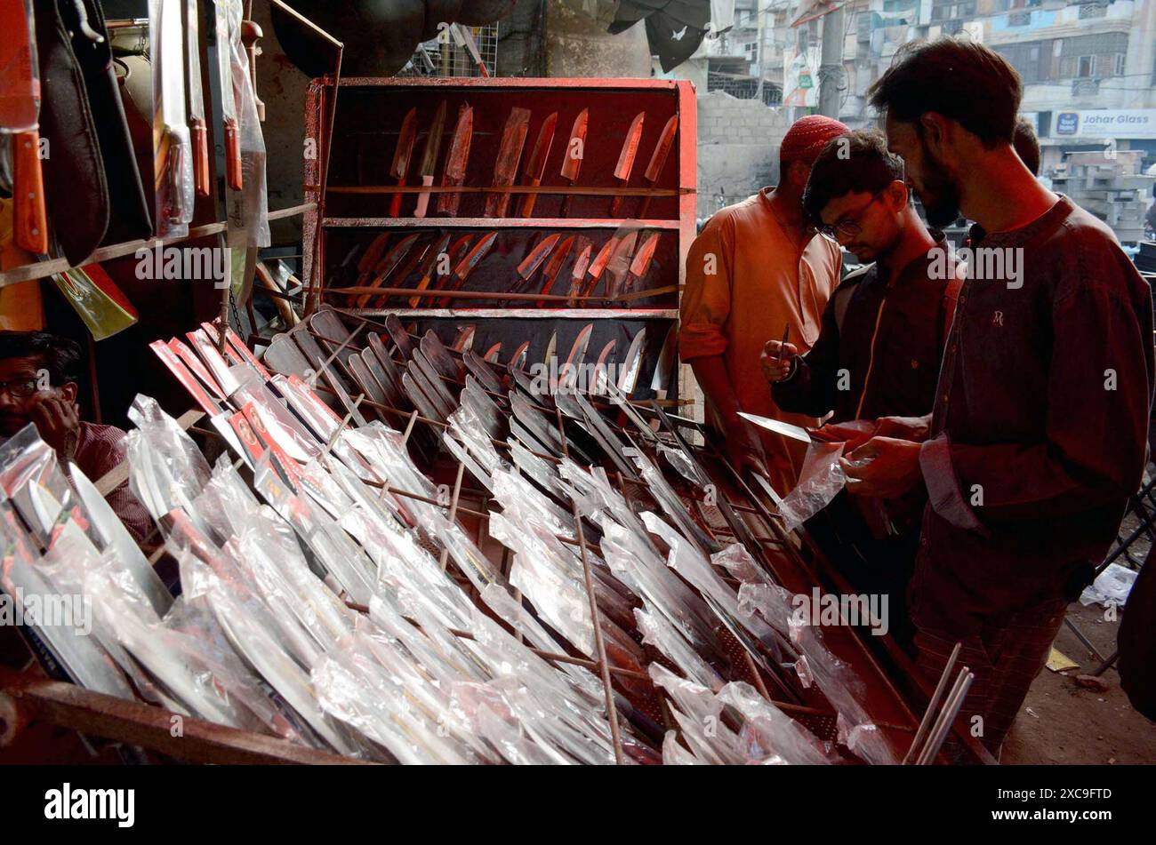 KARACHI, PAKISTAN, JUN 15: Butcher knives are being selling to ...