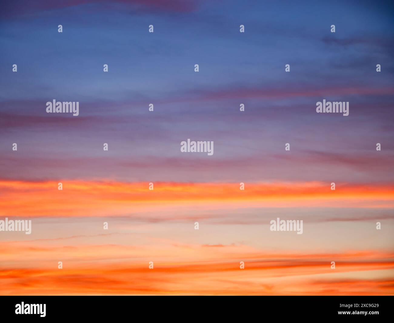 A picturesque view of the evening sky’s vibrant yet calming colors ...