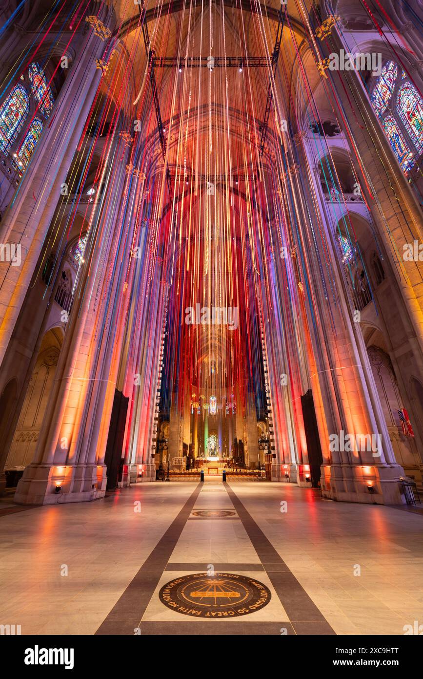 Cathedral of Saint John the Divine interior installation celebrating Pride month. Nave ...