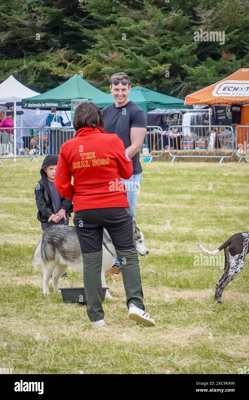Powderham, UK. 15th June, 2024. Dog lovers descend on Powderham Castle ...