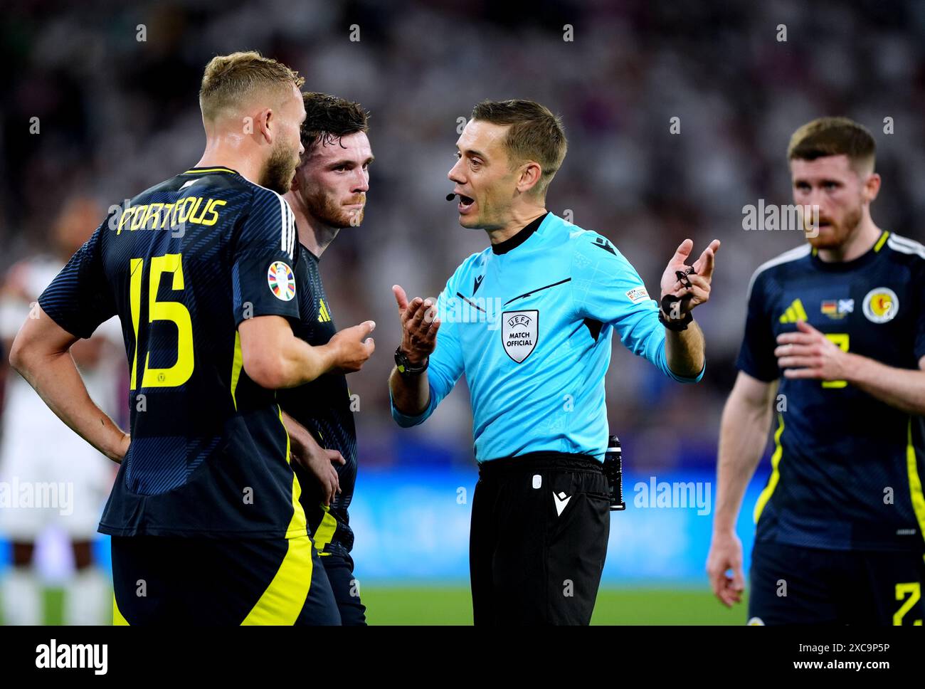 Scotland's Ryan Porteous speaks to referee Clement Turpin after a foul ...