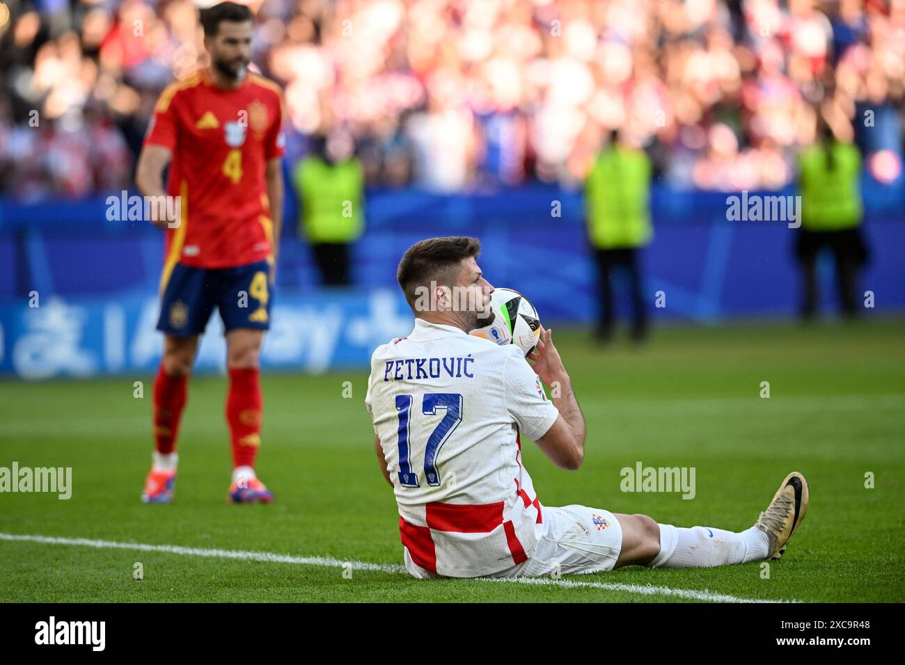 Berlin, Germany. 15th June 2024. Bruno Petkovic of Croatia is fouled by ...
