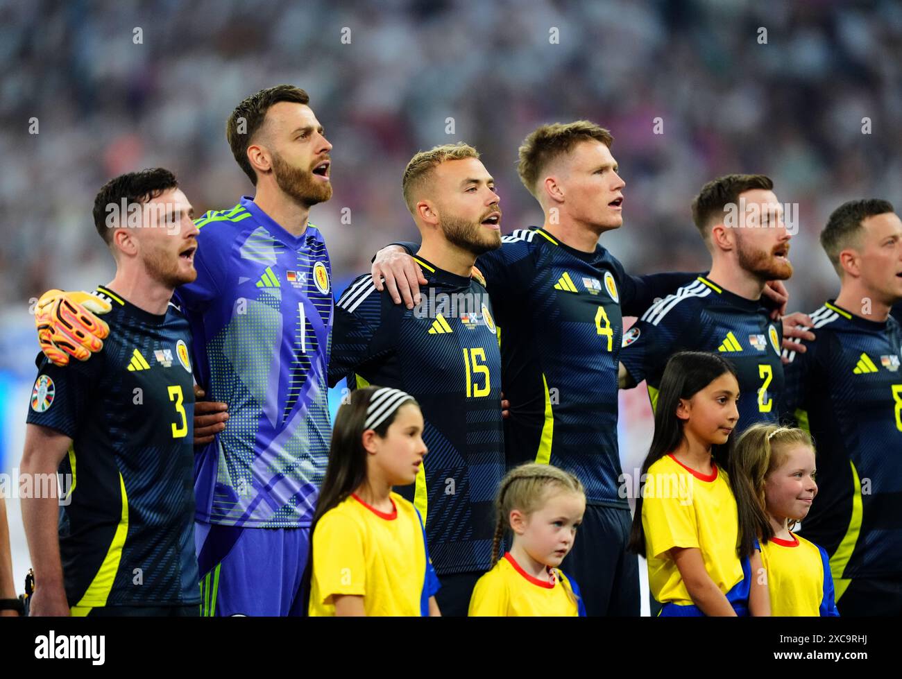 Scotland players sing the national anthem ahead of the UEFA Euro 2024 ...