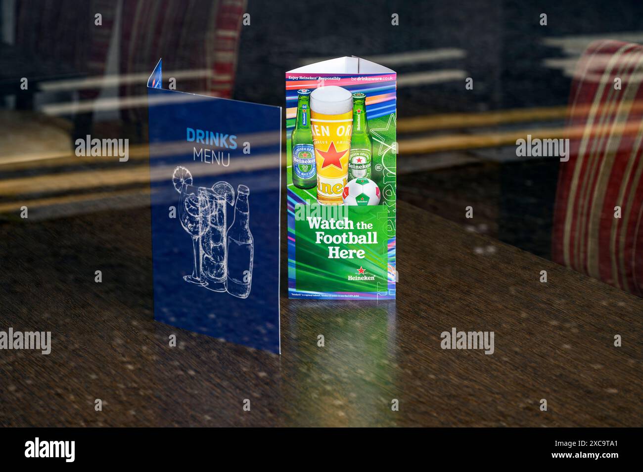 Heineken 0.0 non alcohol beer advertised in a pub window, Scotland, UK ...