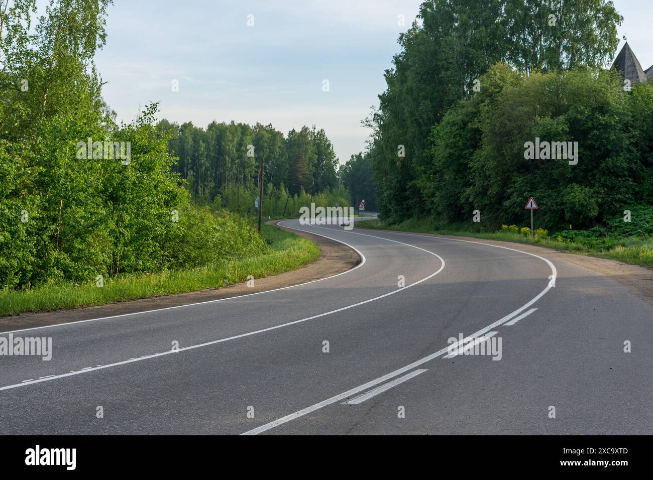 Highway through the forest. Empty roadway without cars or people Stock ...