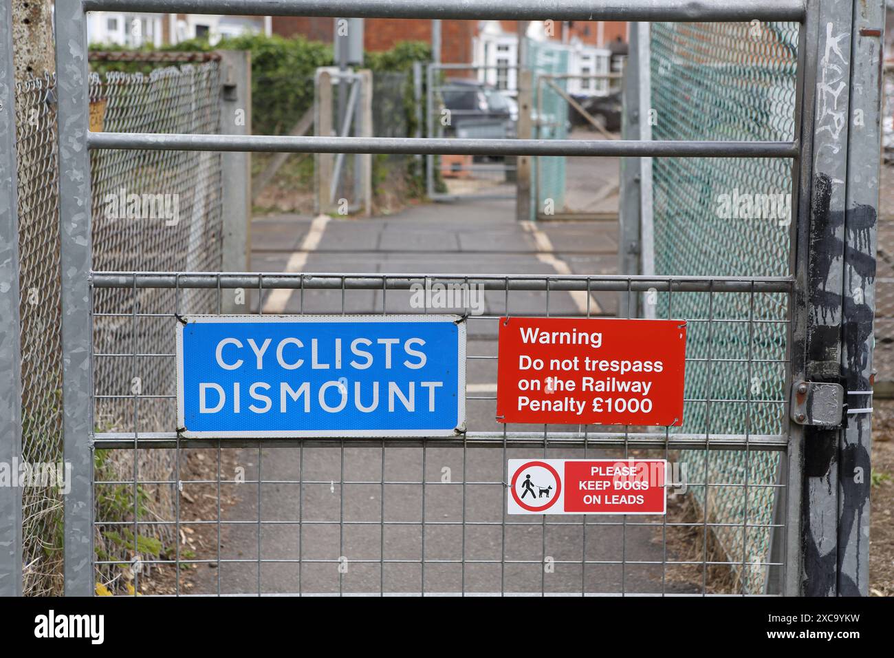 Railway foot crossing Frimley Green Hampshire UK with warning signs ...
