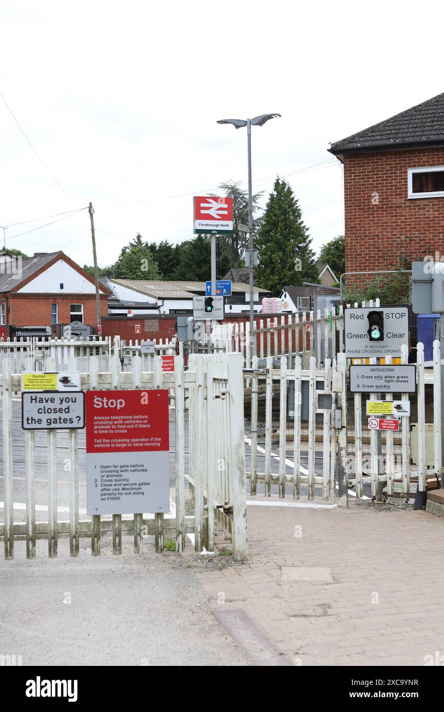 Railway pedestrian crossing Farnborough North station Hampshire UK ... Railway pedestrian crossing Farnborough North station Hampshire UK ...