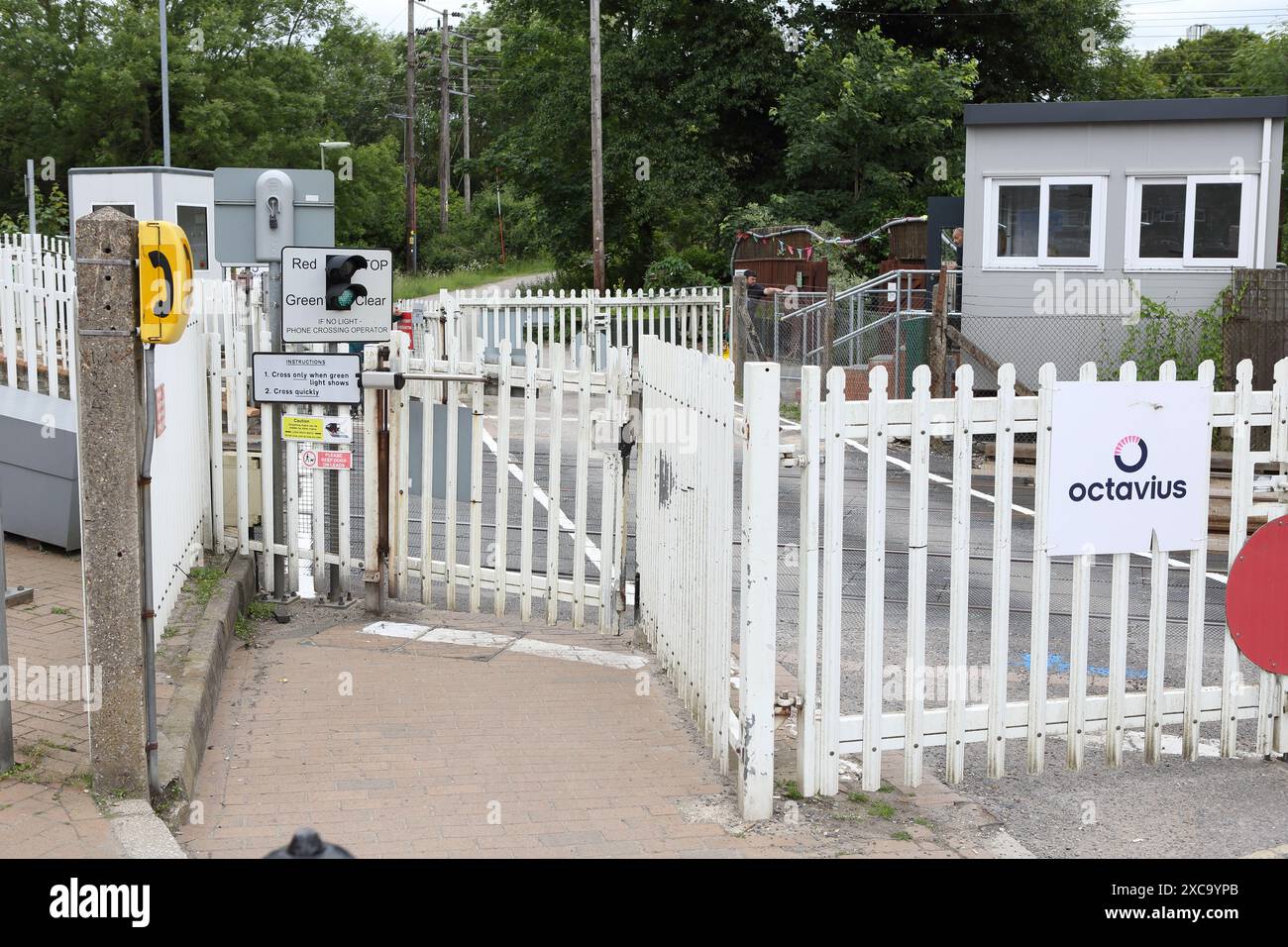 Railway pedestrian crossing Farnborough North station Hampshire UK ... Railway pedestrian crossing Farnborough North station Hampshire UK ...