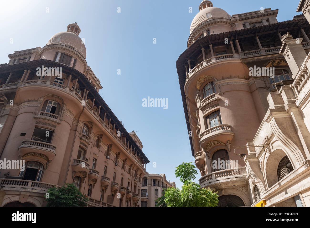 Classic Cairo architecture with details showing beautiful covered balconies and domed roofs ...