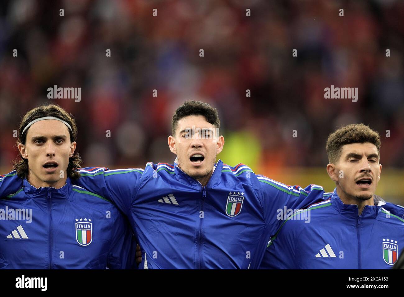 Dortmund, Germany. 15th June, 2024. Italy's Riccardo Calafiori, Italy's Alessandro Bastoni and ...