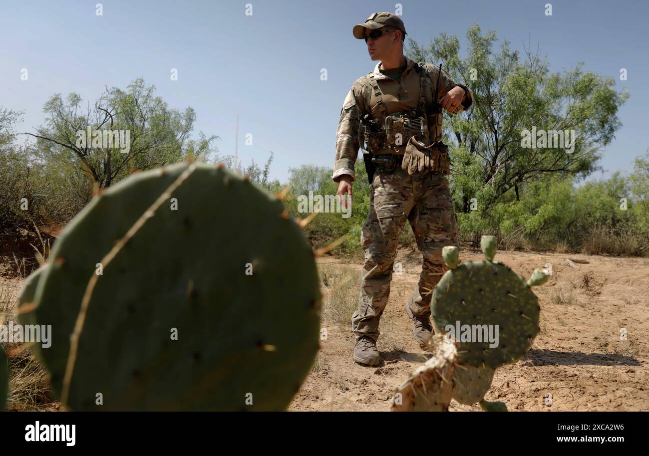 A U.S. Border Patrol Search, Trauma, and Rescue (BORSTAR) agent ...