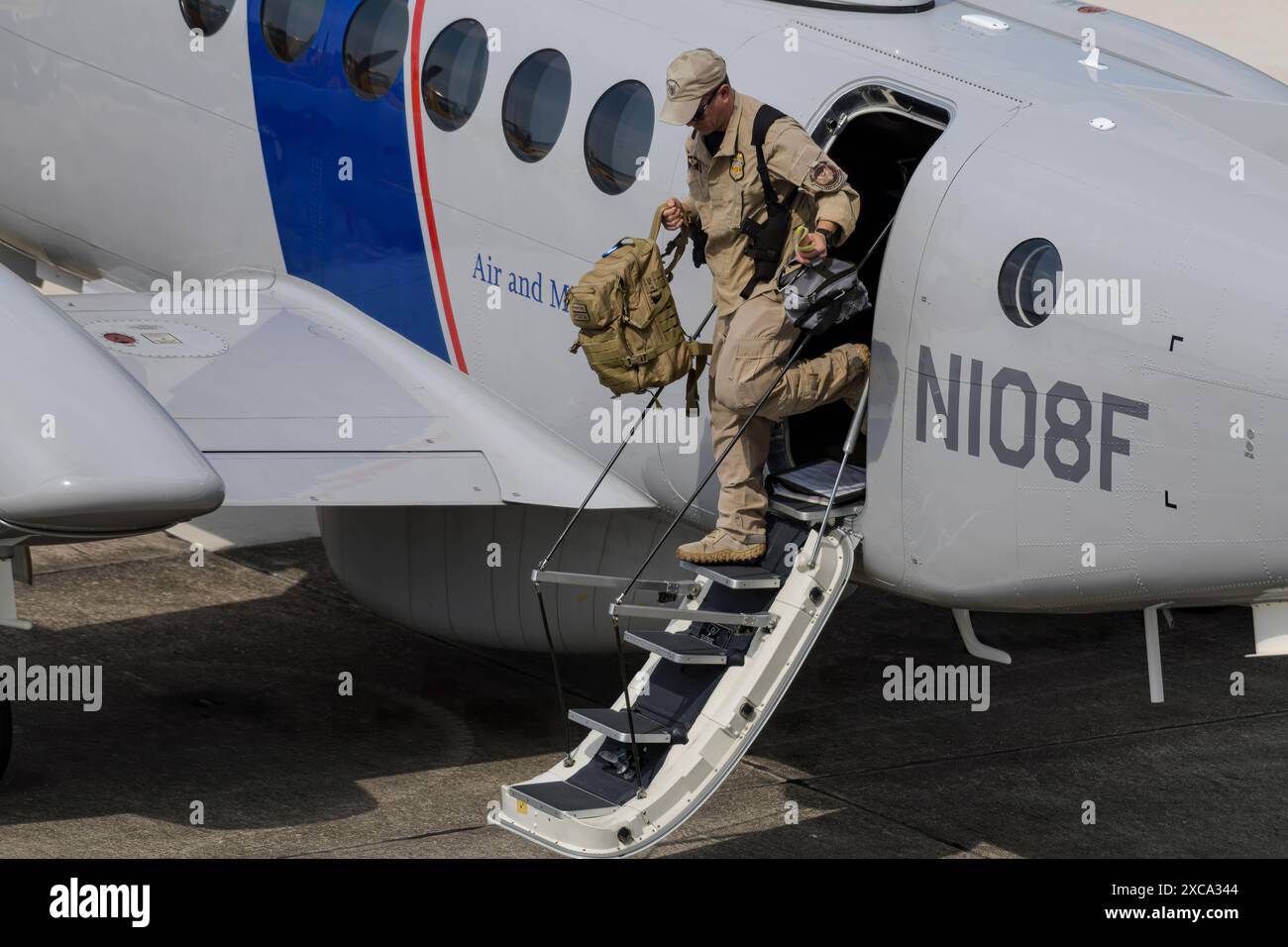 A CBP Air and Marine Operations Multi-Role Enforcement Aircraft lands ...