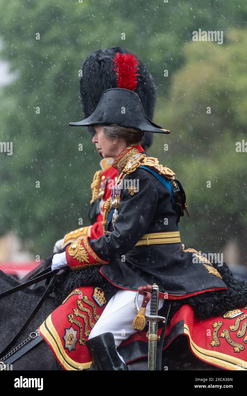 Anne, Princess Royal, Royal Colonel riding in heavy rain during ...