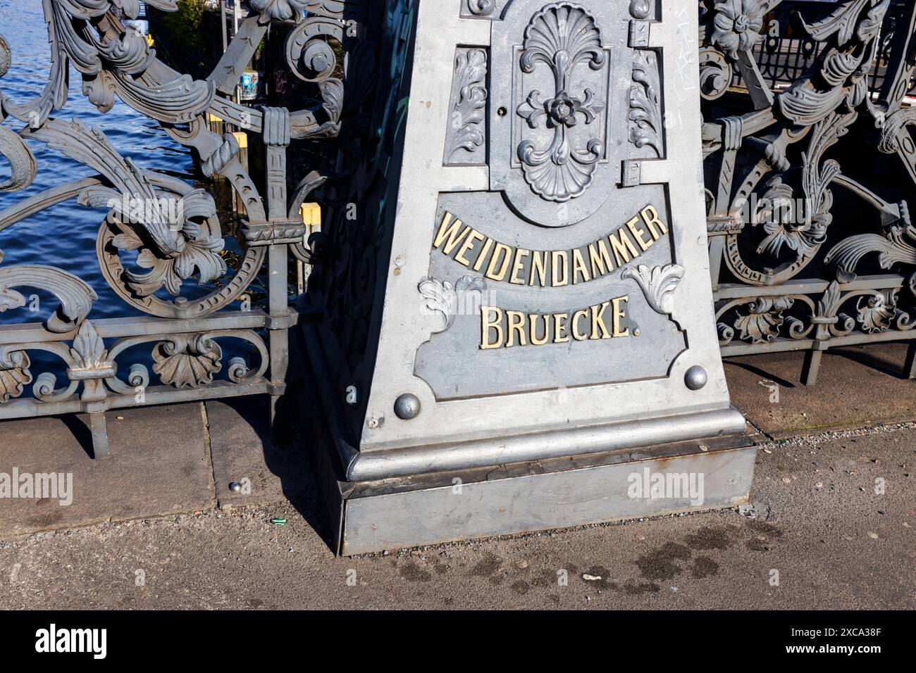 Berlin, Germany Sign on the cast iron grating of the Weidendammer ...