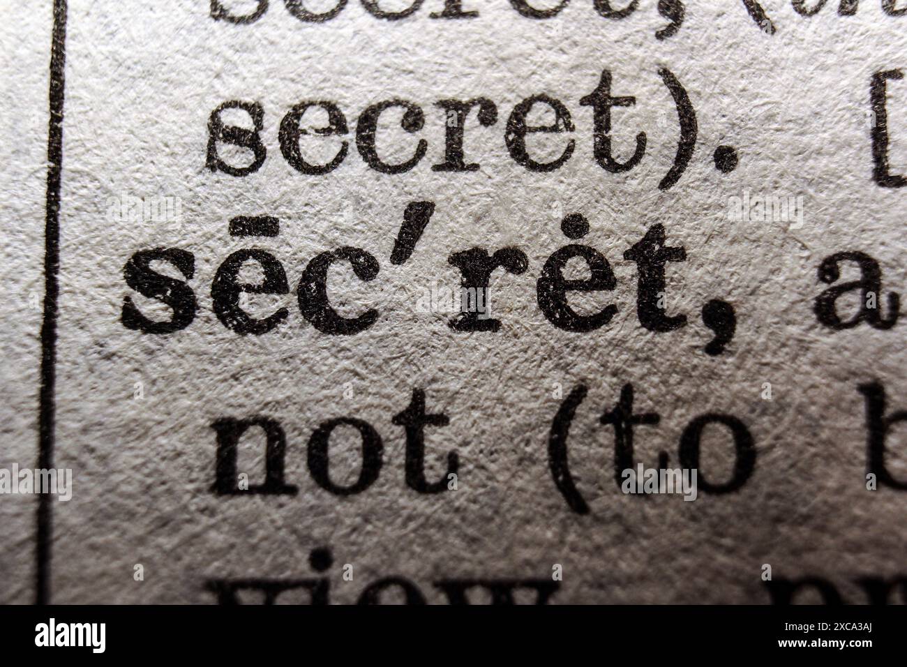 Word secret on dictionary page, macro close-up Stock Photo - Alamy