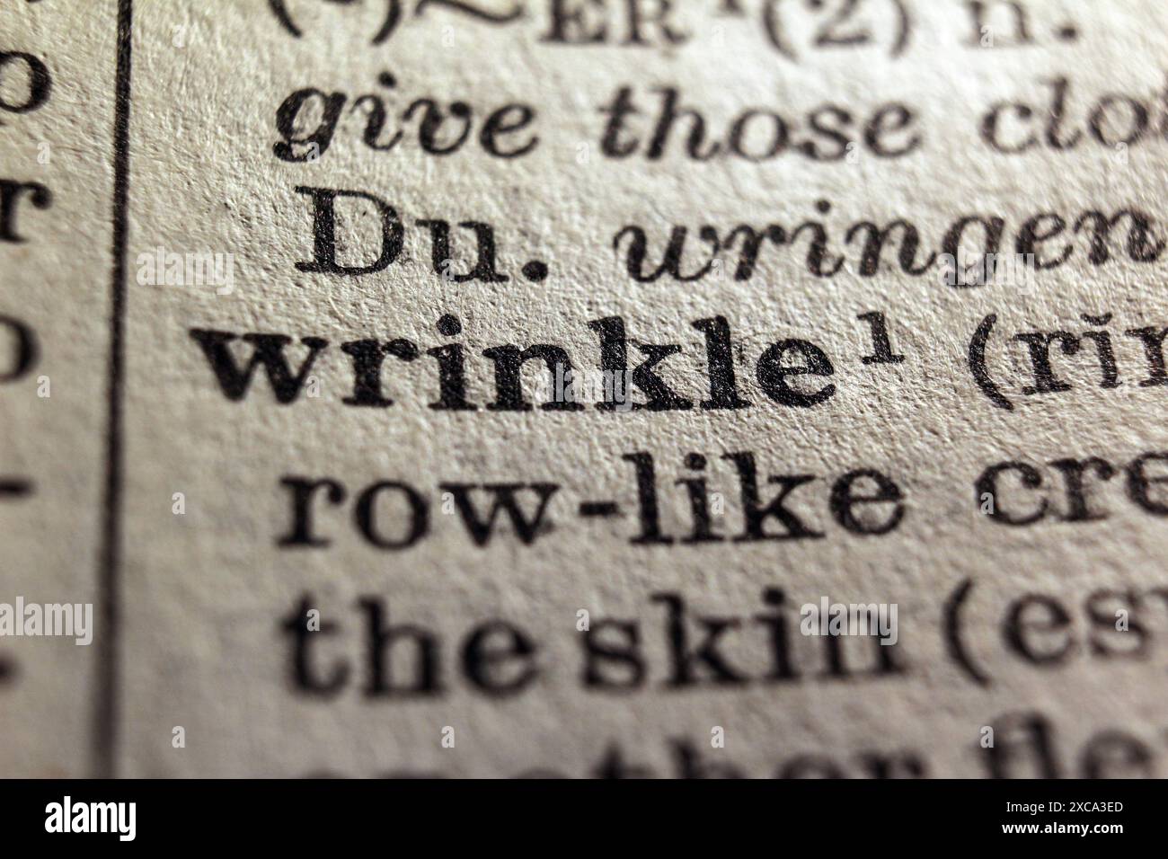 Word wrinkle on dictionary page, macro close-up Stock Photo - Alamy