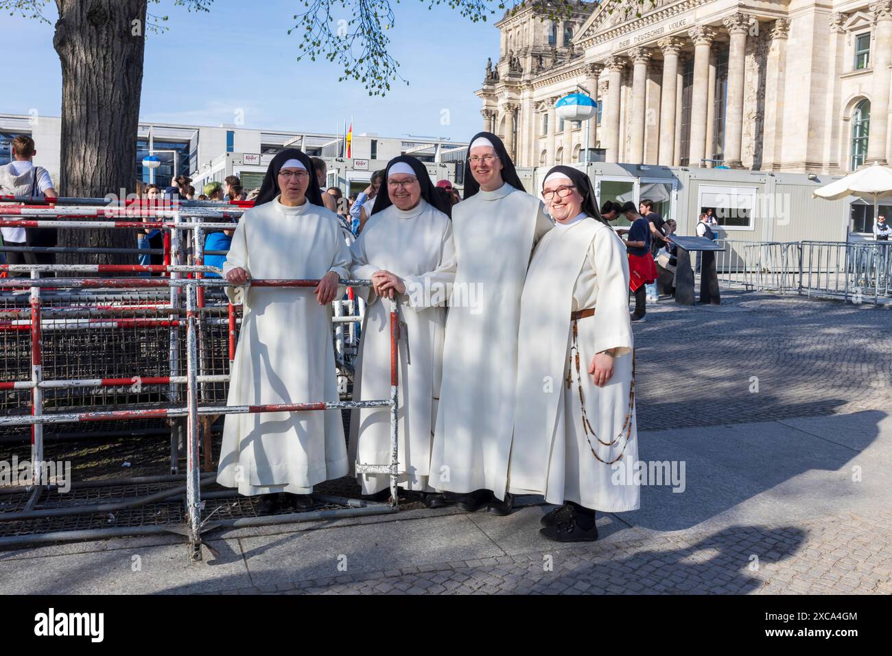 Berlin, Germany - May 2, 2024, Four nuns pose for a photo near the ...