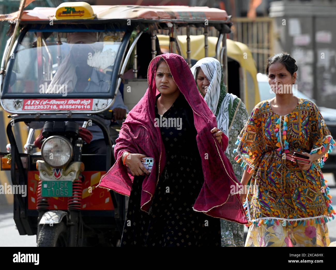 NOIDA, INDIA - JUNE 15: Commuters brave the heat Wave during a hot ...
