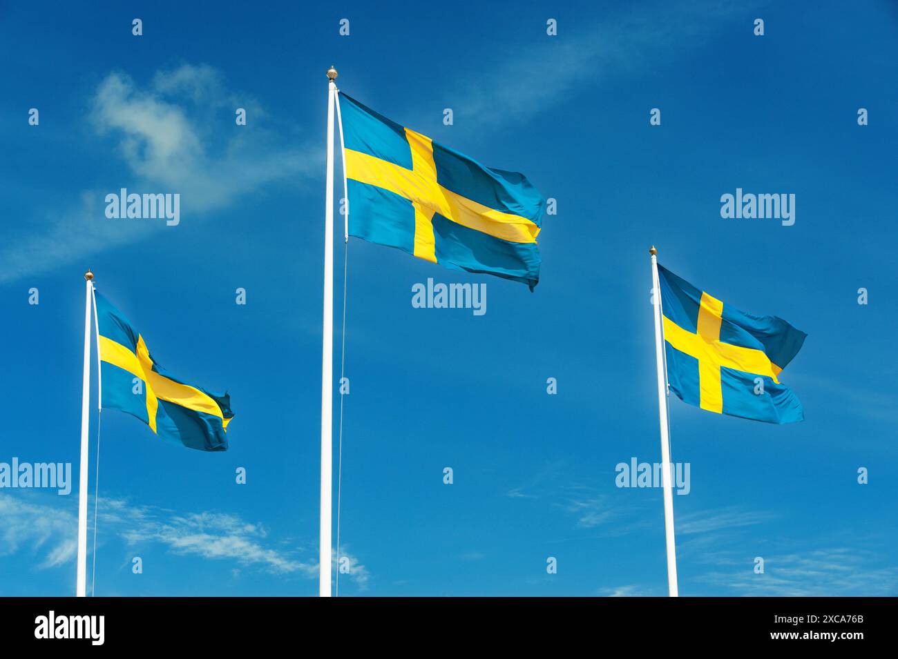 Three swedish flags Stock Photo - Alamy