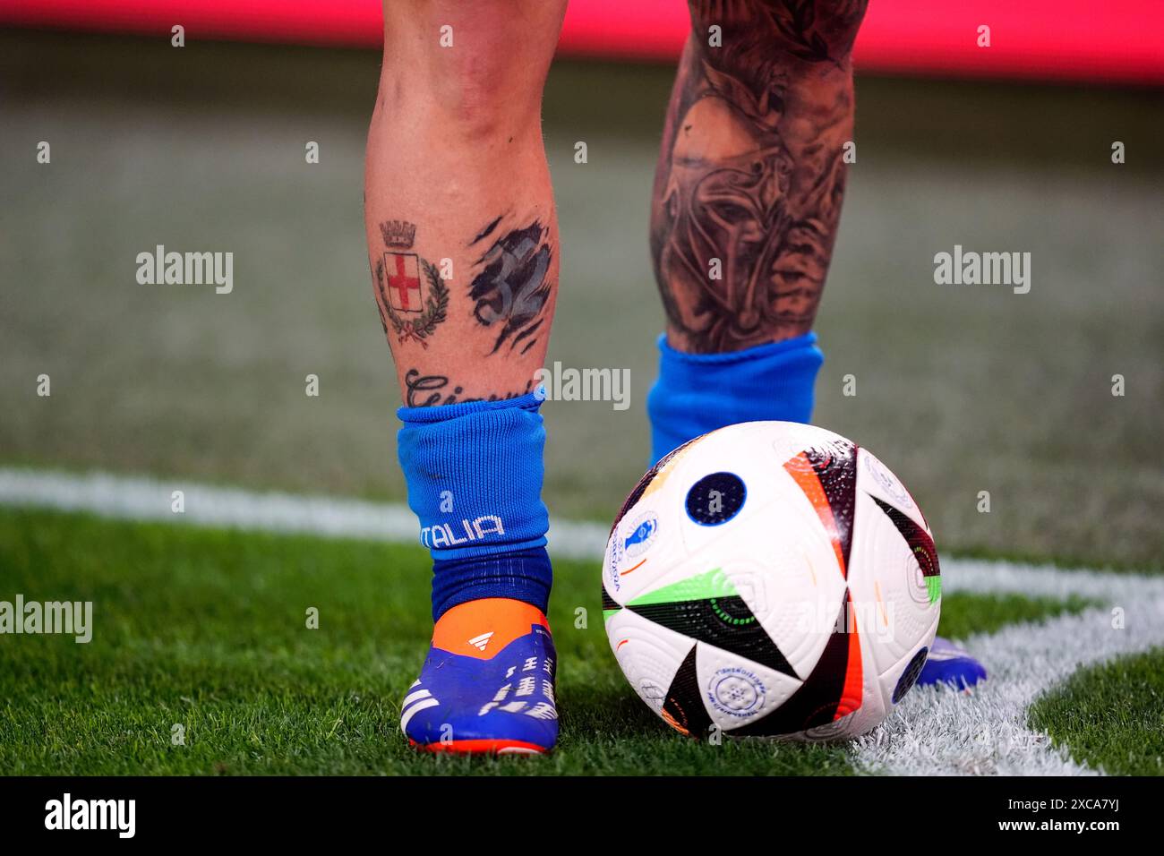 Tattoo's on the legs of italy's federico dimarco during the uefa euro ...