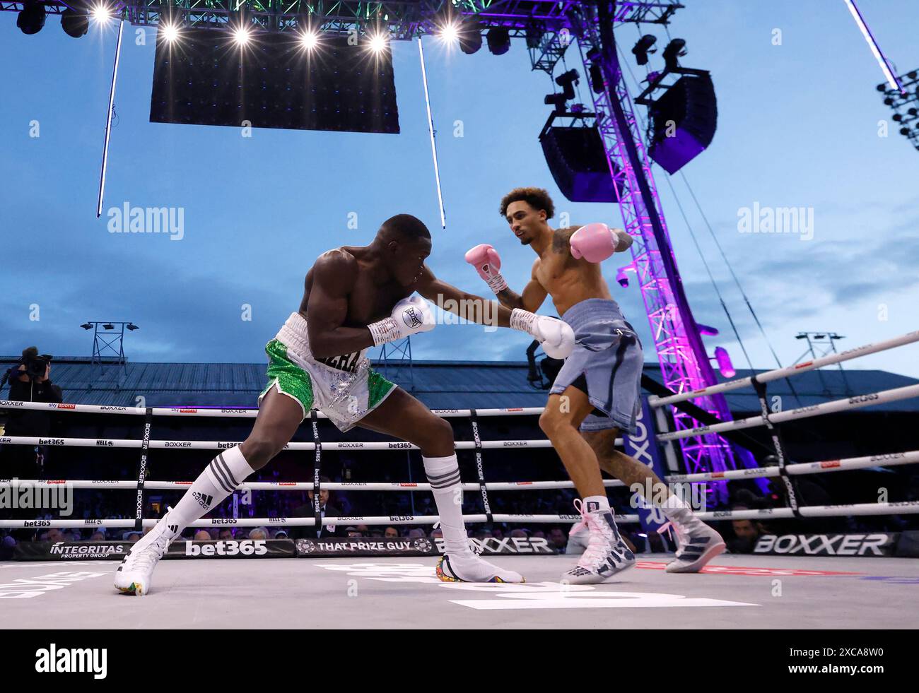 Eworitse Ezra Arenyeka (left) and Ben Whittaker in the vacant IBF ...