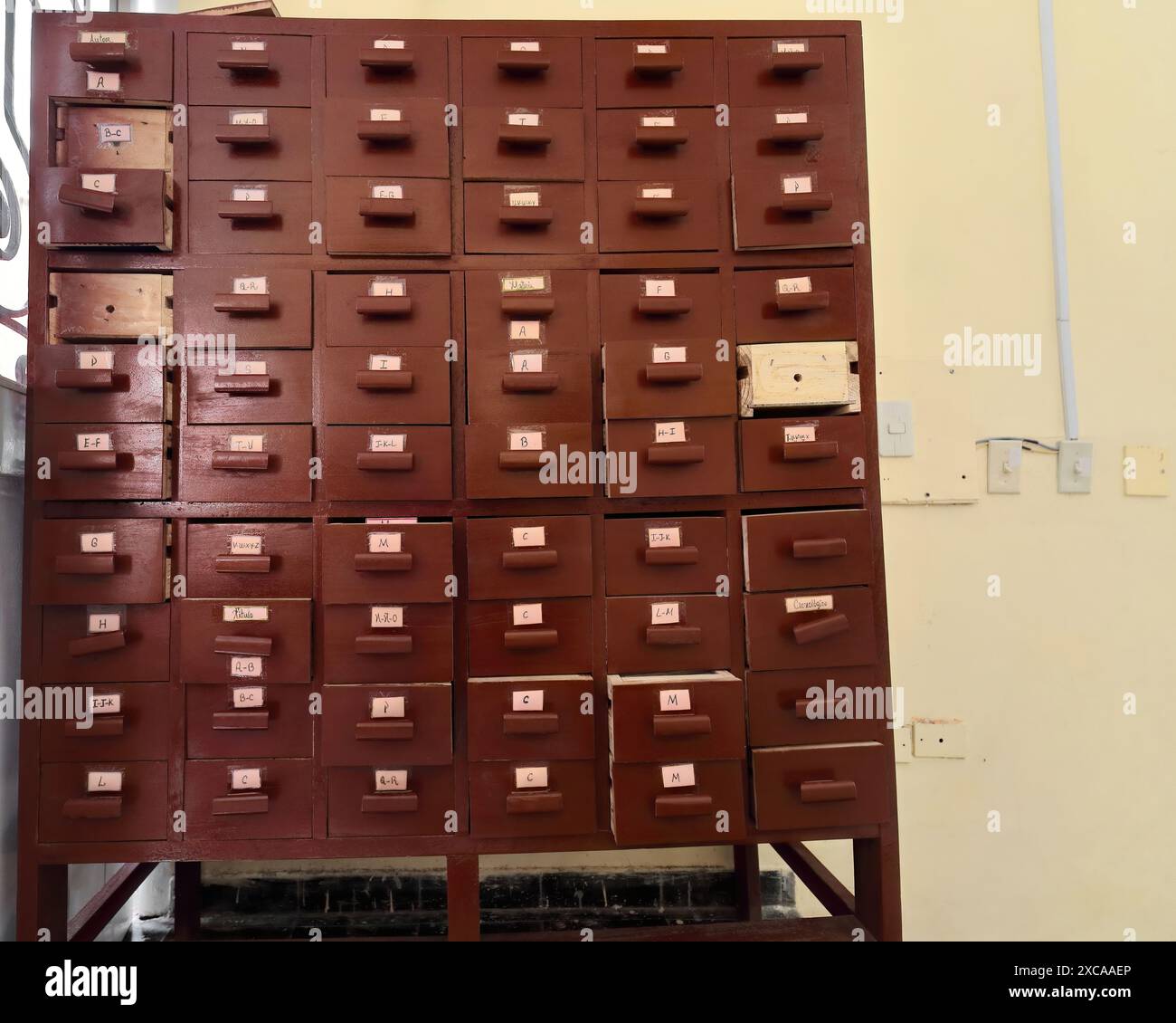 381 Vintage wooden file cabinet featuring drawers with label holders to ...