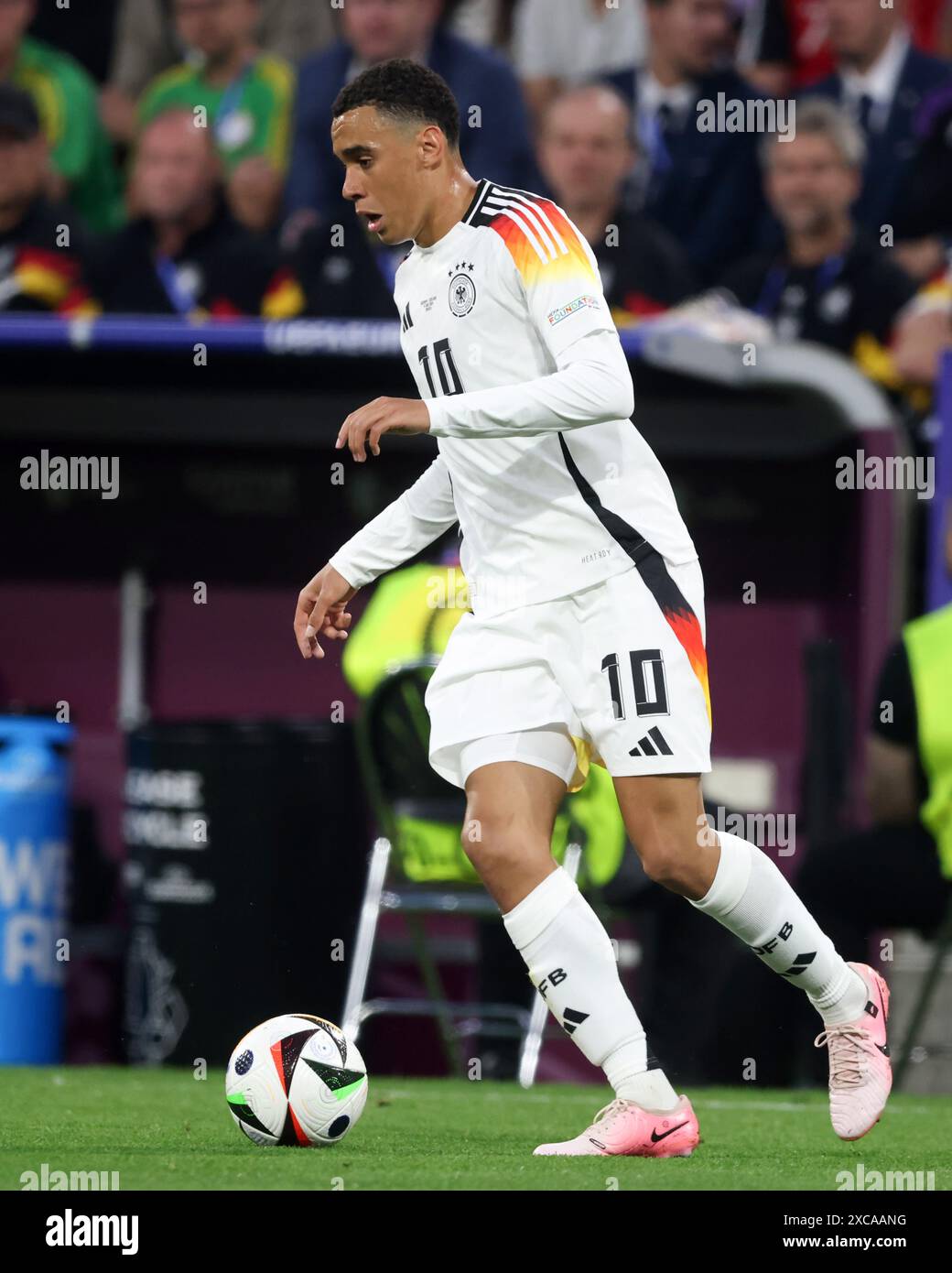 MUNICH, GERMANY - JUNE 14: Jamal Musiala of Germany runs with a ball ...
