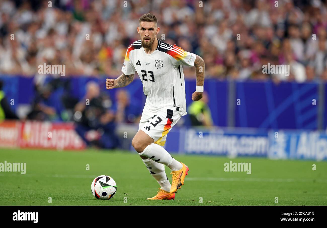 MUNICH, GERMANY - JUNE 14: Robert Andrich of Germany runs with a ball ...