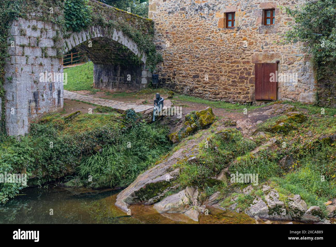 Bronze statue of the urban legend, the ‘Fish Man of Lierganes’ beside ...