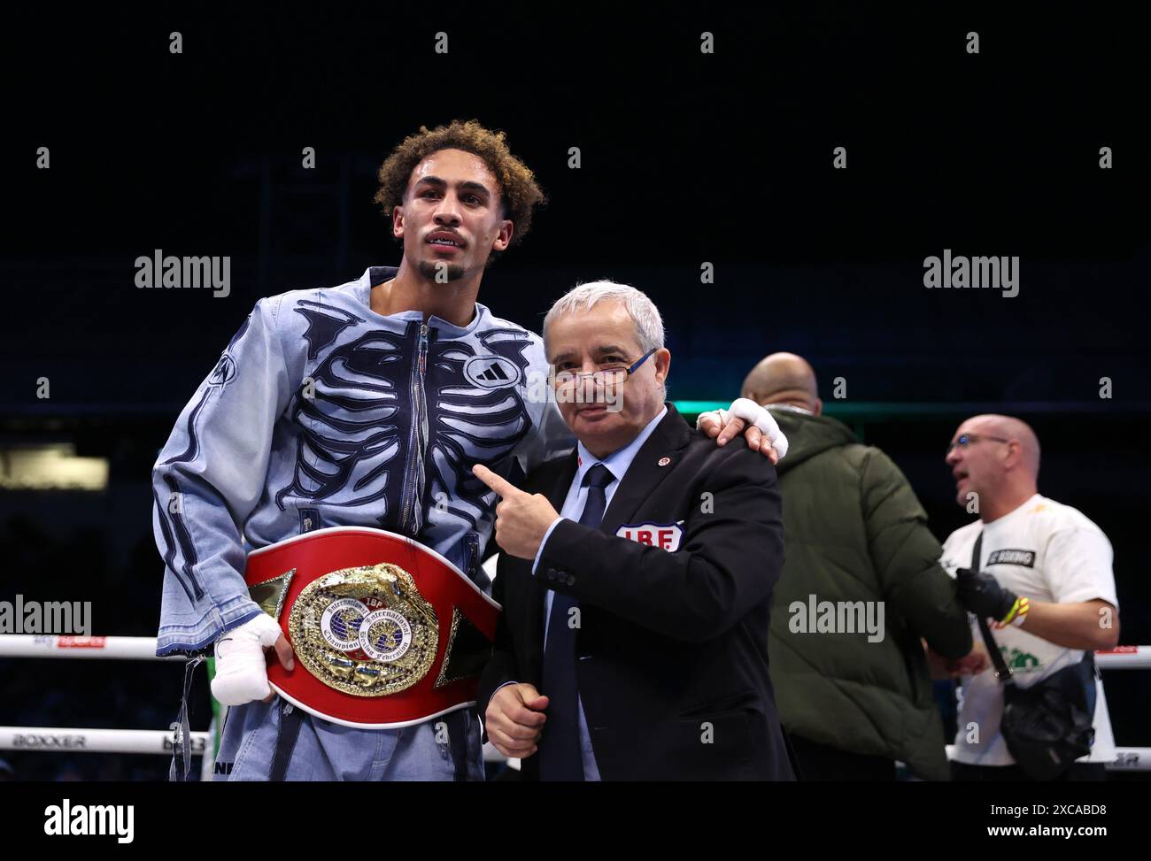 Ben Whittaker (left) celebrates victory against Eworitse Ezra Arenyeka ...