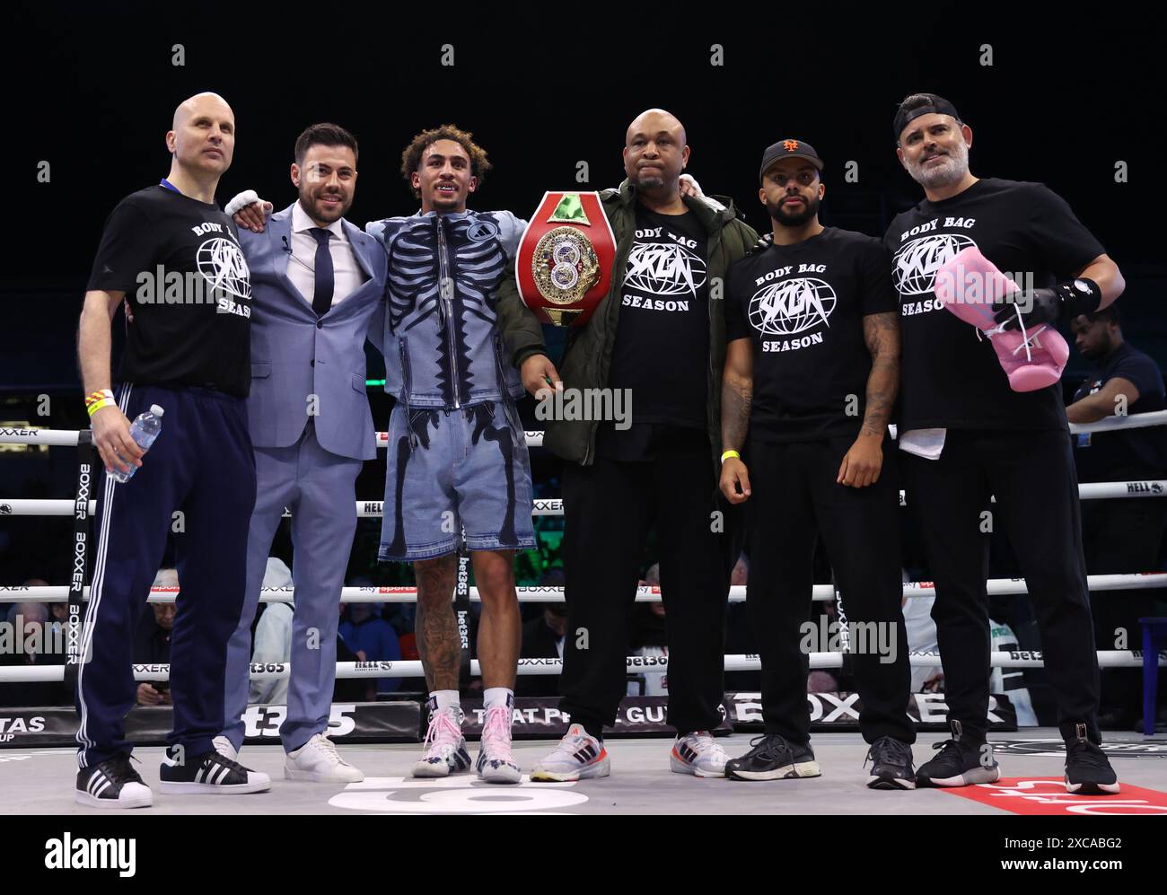 Ben Whittaker and his team celebrate victory against Eworitse Ezra ...