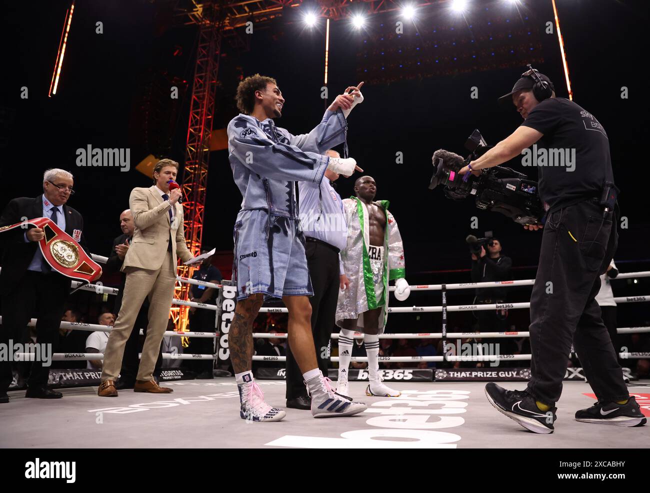 Ben Whittaker (centre) celebrates victory against Eworitse Ezra ...