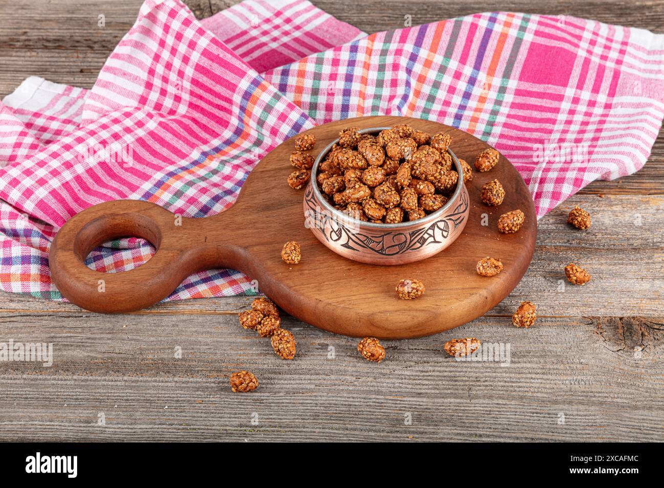 Sesame coated peanuts with honey and molasses, traditional turkish nut ...