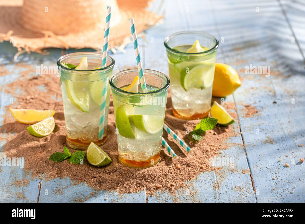 Cold lemonade with crushed ice and sour fruit. Chilled drink for hot ...