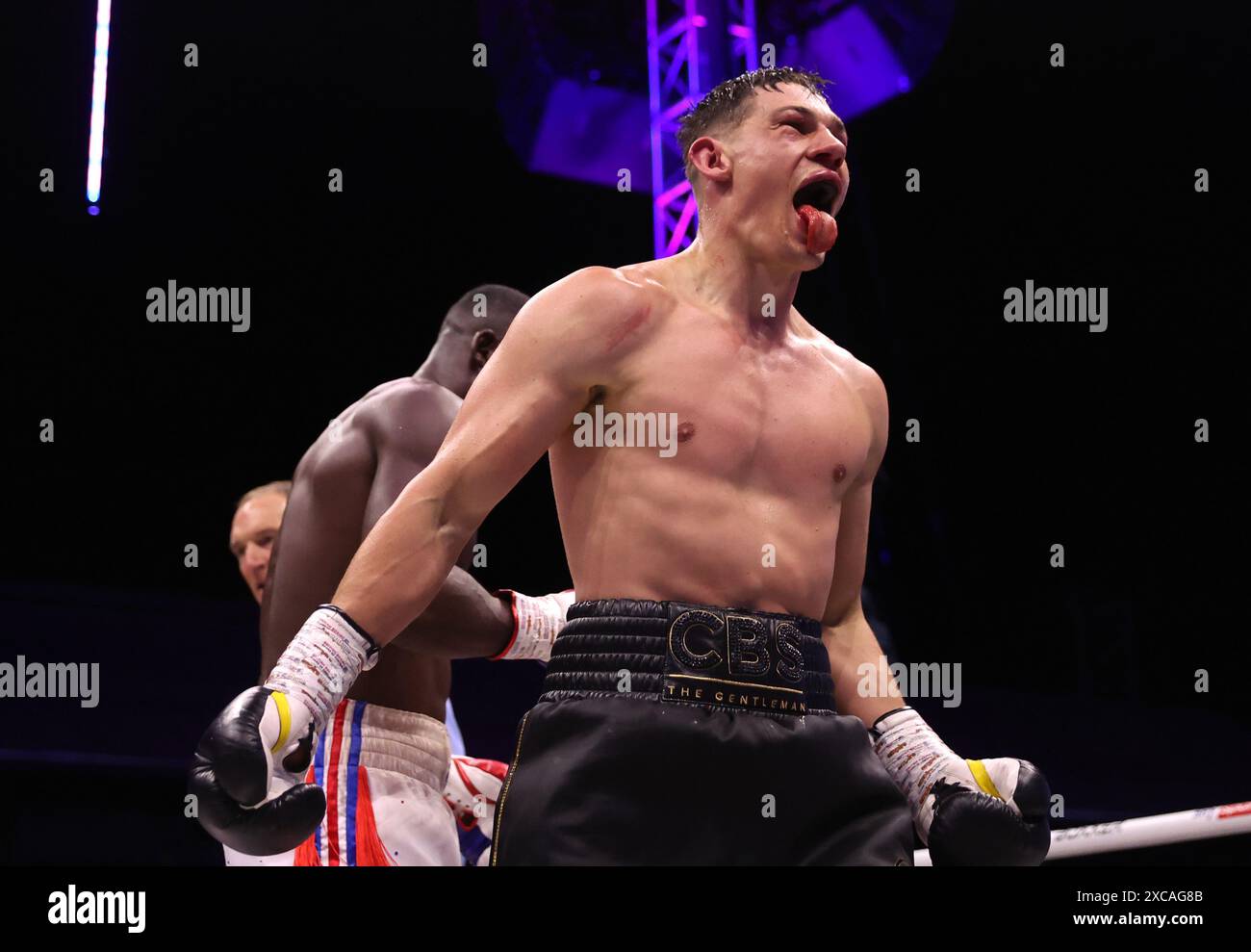 Chris Billam-Smith (right) celebrates victory by unanimous decision ...