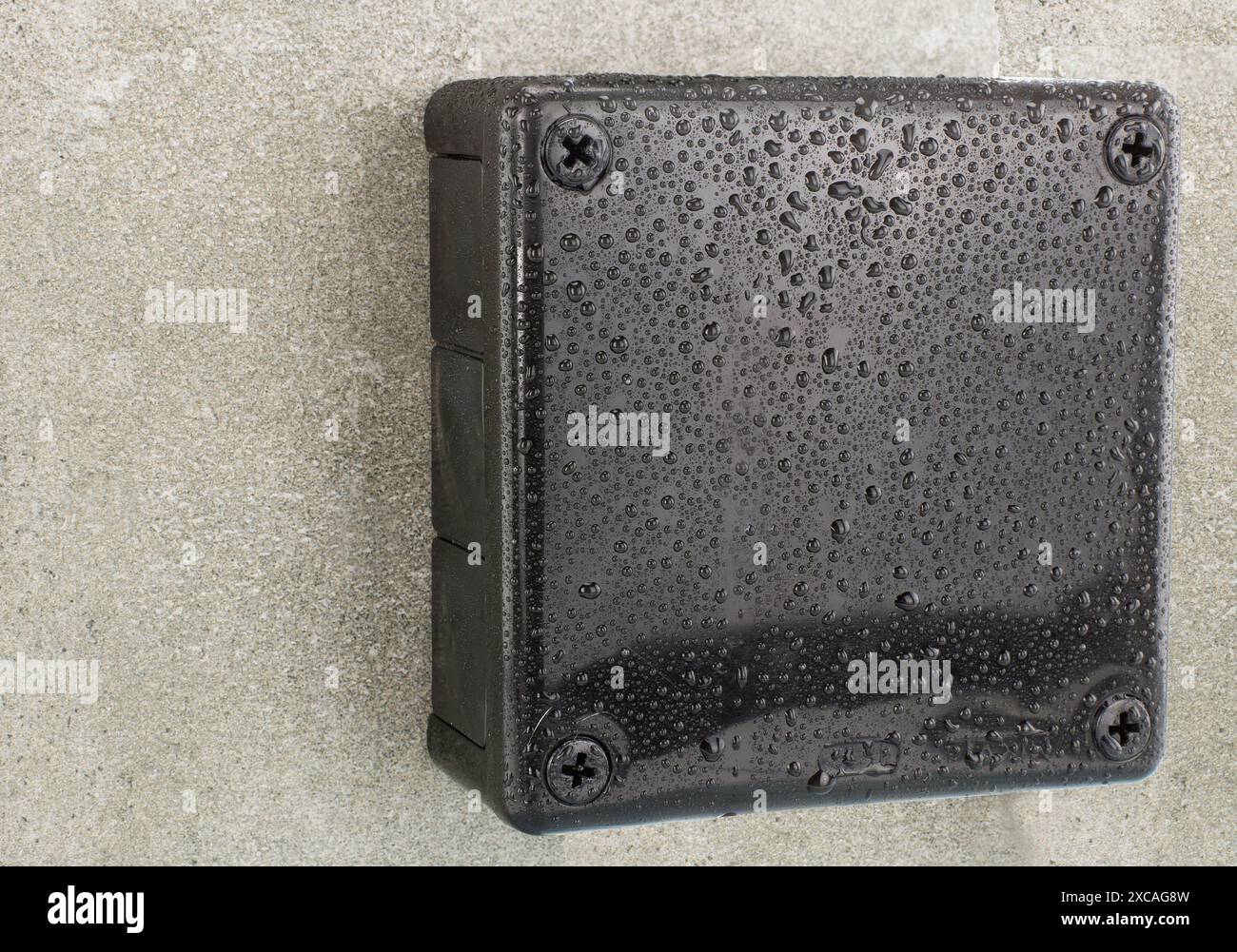 Waterproof Electrical Black Junction Box Stock Photo - Alamy