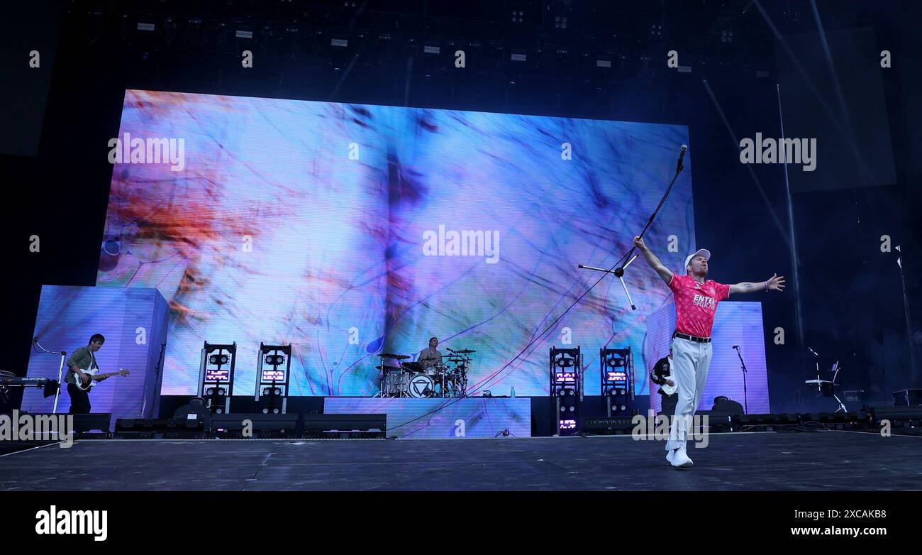 Leicestershire, UK. Saturday June 15, 2024. Enter Shikari vocalist Rou ...