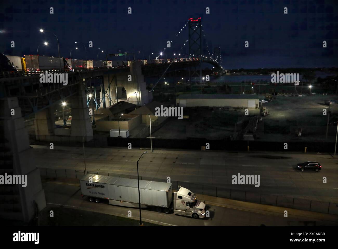 The Ambassador Bridge at dusk with cargo traffic. The Ambassador Bridge ...