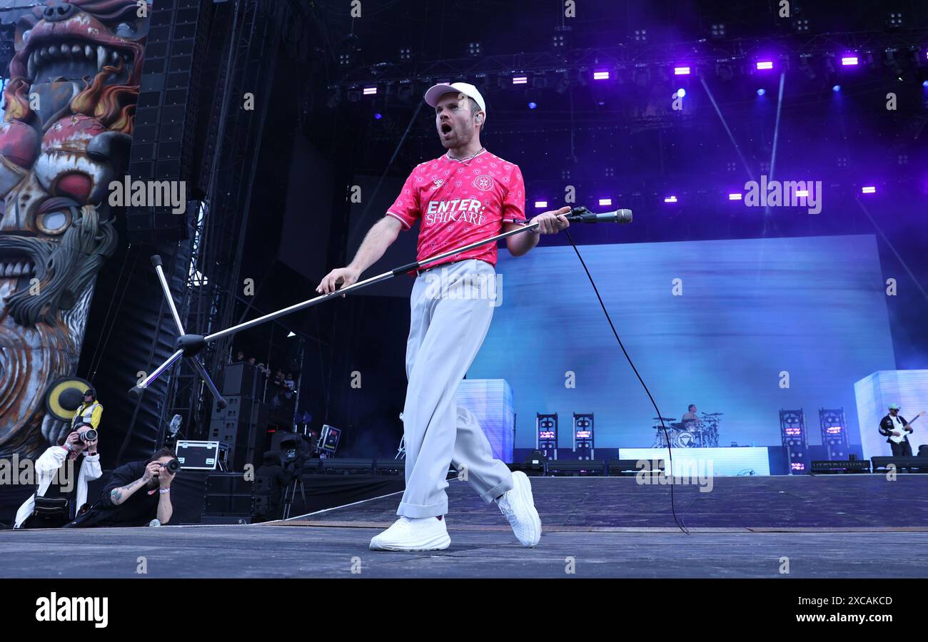 Leicestershire, UK. Saturday June 15, 2024. Enter Shikari vocalist Rou ...