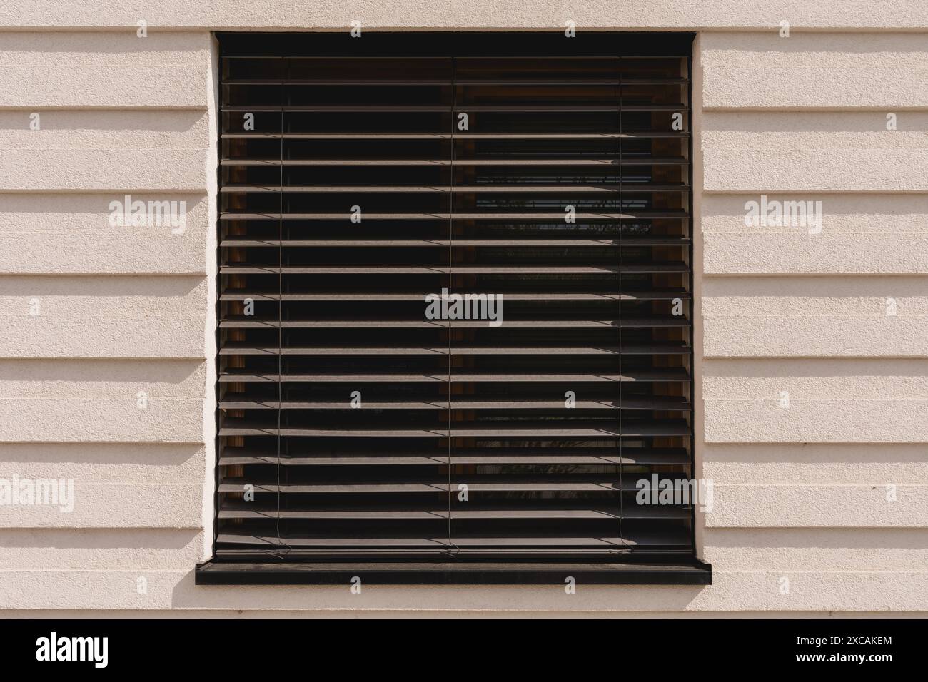 Modern Window with Closed Horizontal Blinds on Beige Textured Wall ...
