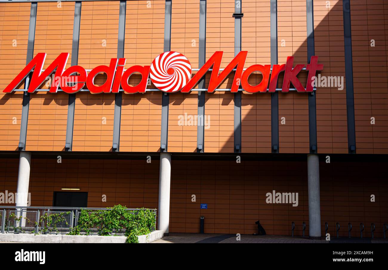 Facade of an electronics store with advertising hi-res stock ...