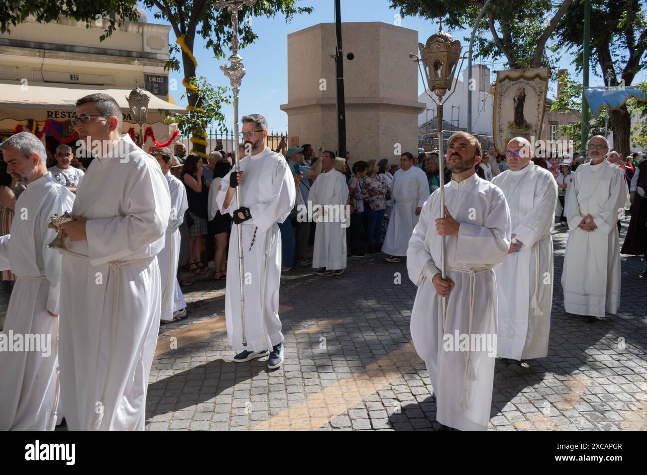 Lisbon, Portugal. June 13, 2024. Priests in the traditional procession ...
